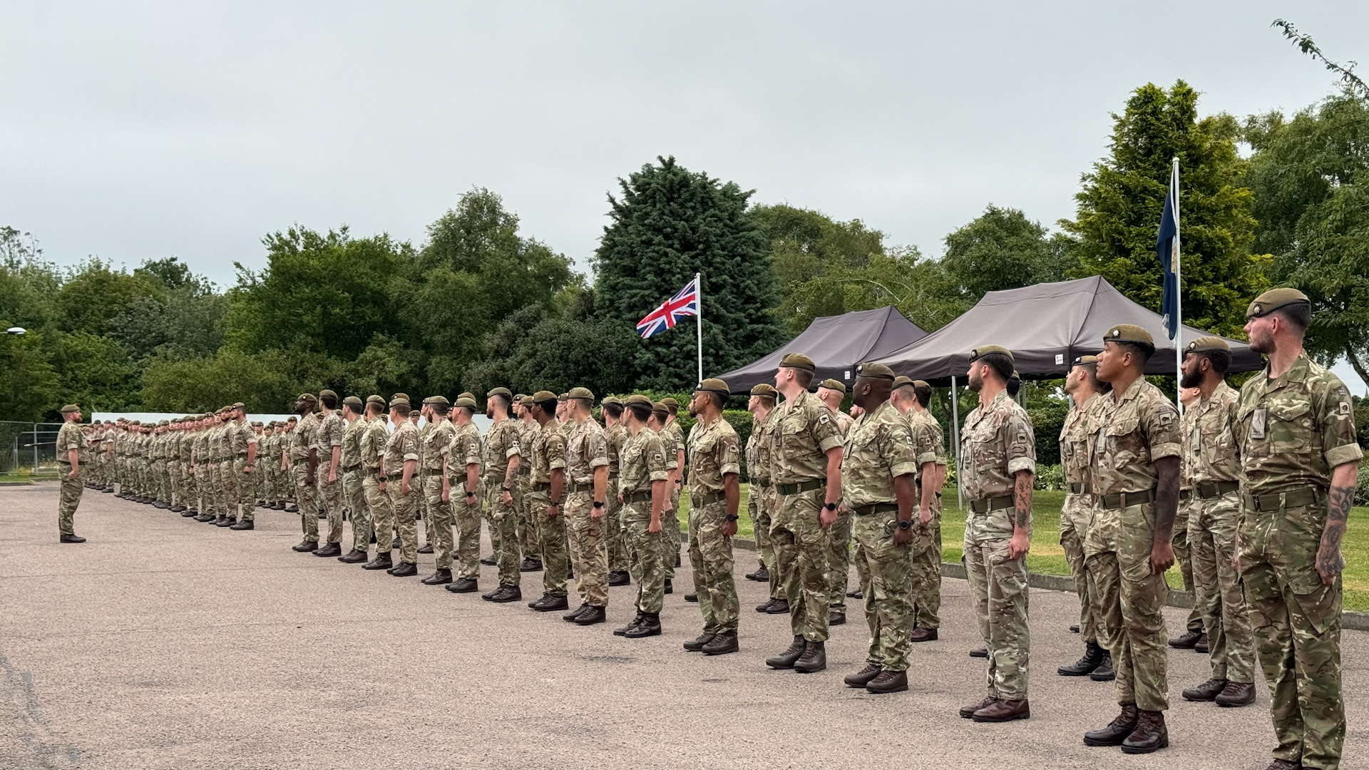 1st Battalion awarded Coronation medals as they take a breather from a ...